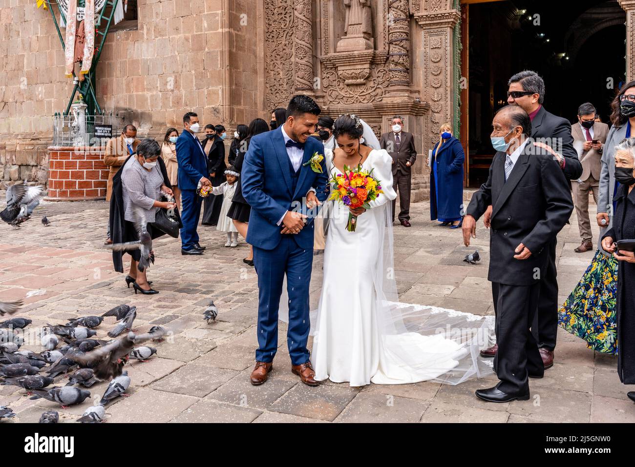 A Young Peruvian Couple Leave The Cathedral After Getting Married, The ...