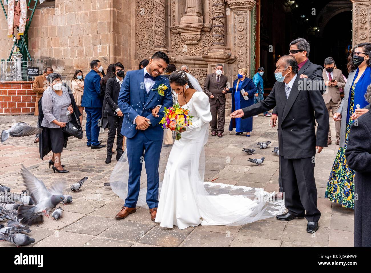 A Young Peruvian Couple Leave The Cathedral After Getting Married, The ...