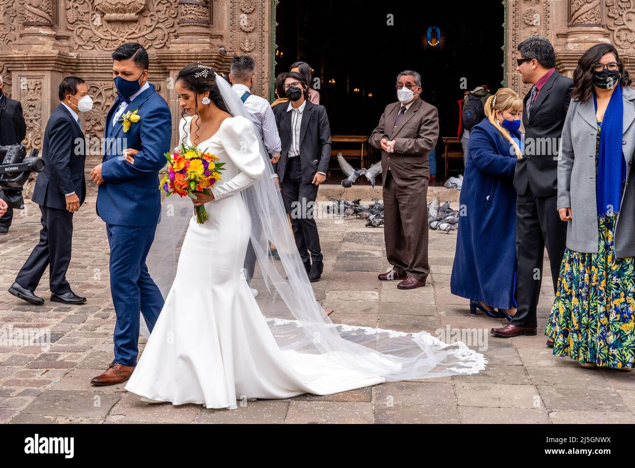 A Young Peruvian Couple Leave The Cathedral After Getting Married, The ...