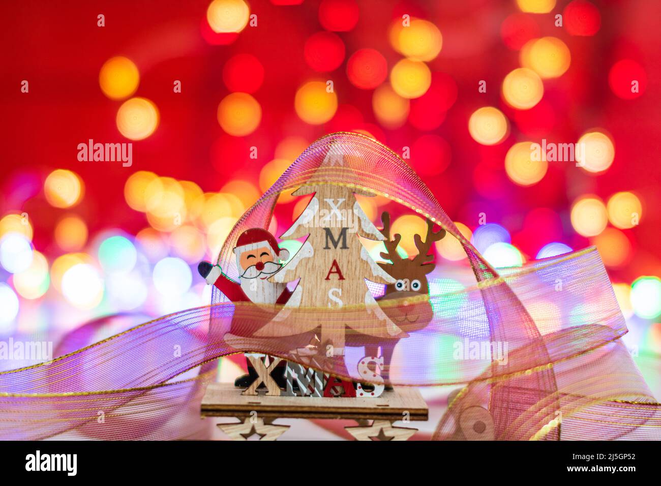 Wooden Christmas sledge with Santa Claus, a reindeer and Christmas tree ...