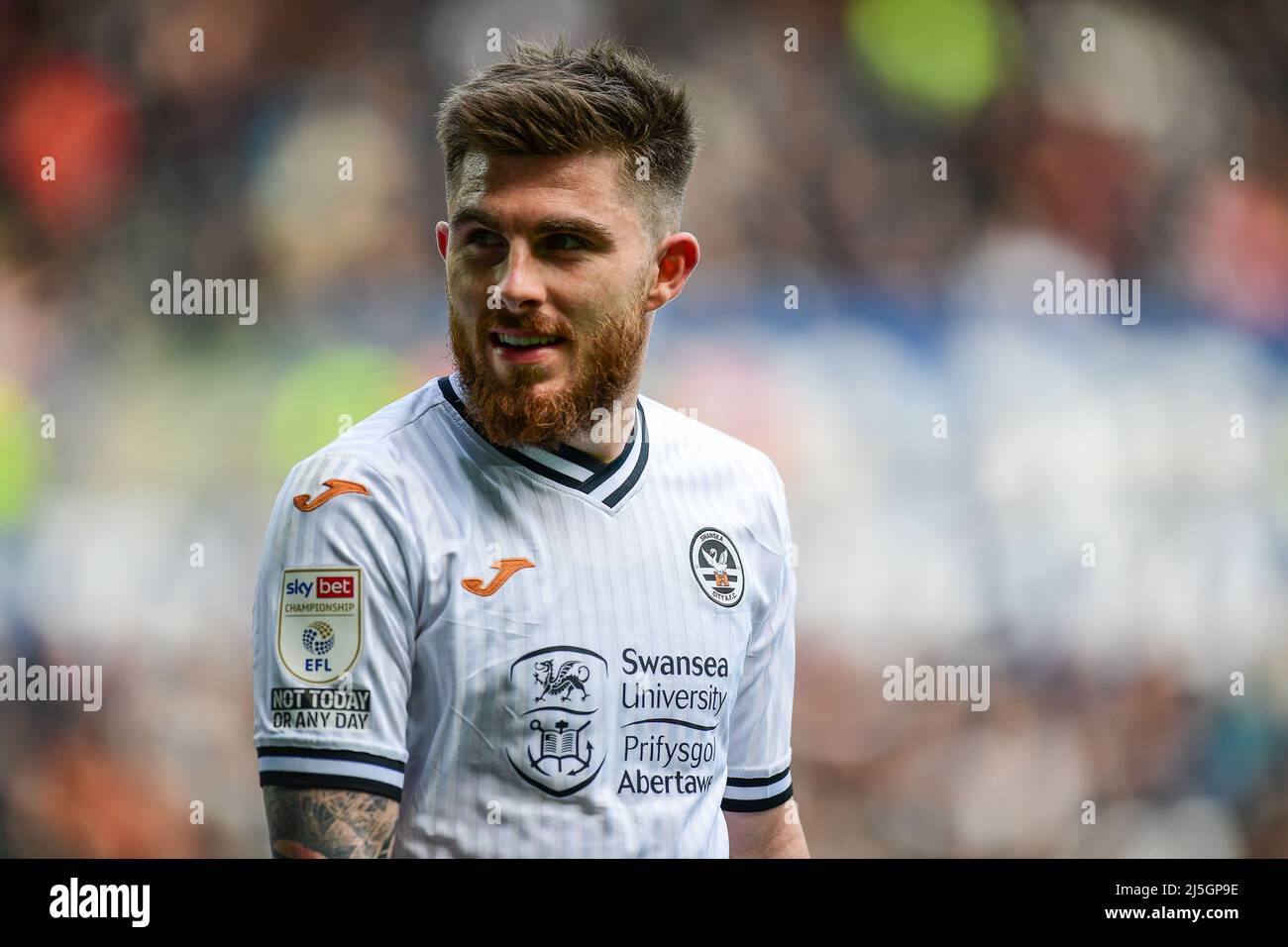 Ryan Manning #3 of Swansea City leaving the pitch following his ...