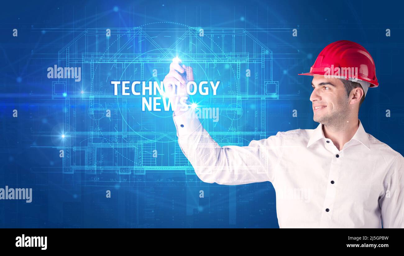 Handsome architect drawing with helmet Stock Photo - Alamy Handsome architect drawing with helmet Stock Photo - Alamy