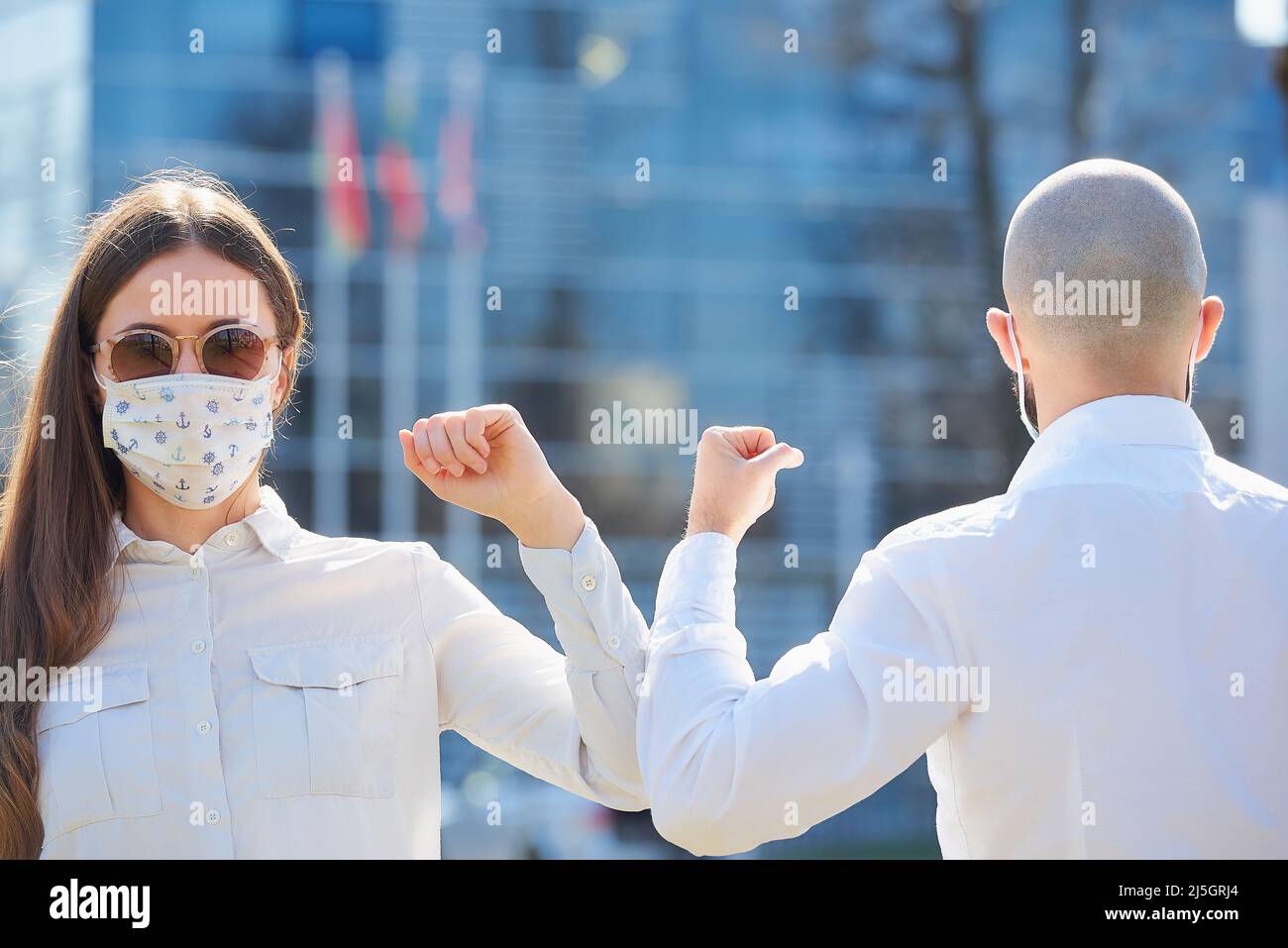 Closeup elbow bump hi-res stock photography and images - Alamy