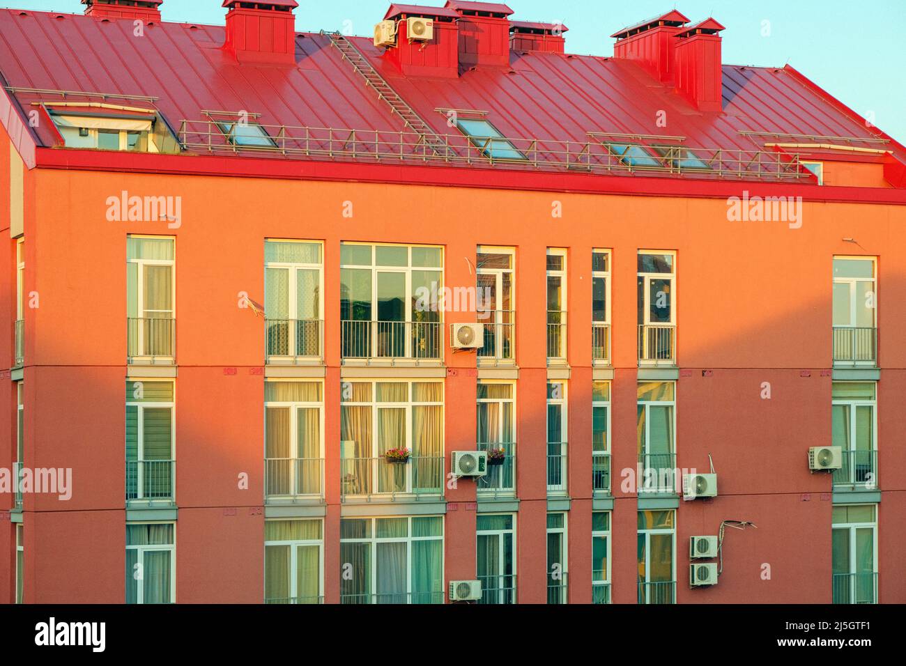 Sharp house roof of red modern building, a residential building with ...