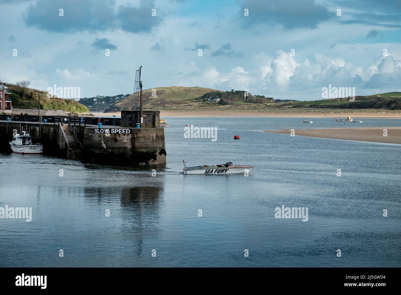 Sea fury speed boat leaving Padstow Harbour and entering the River ...