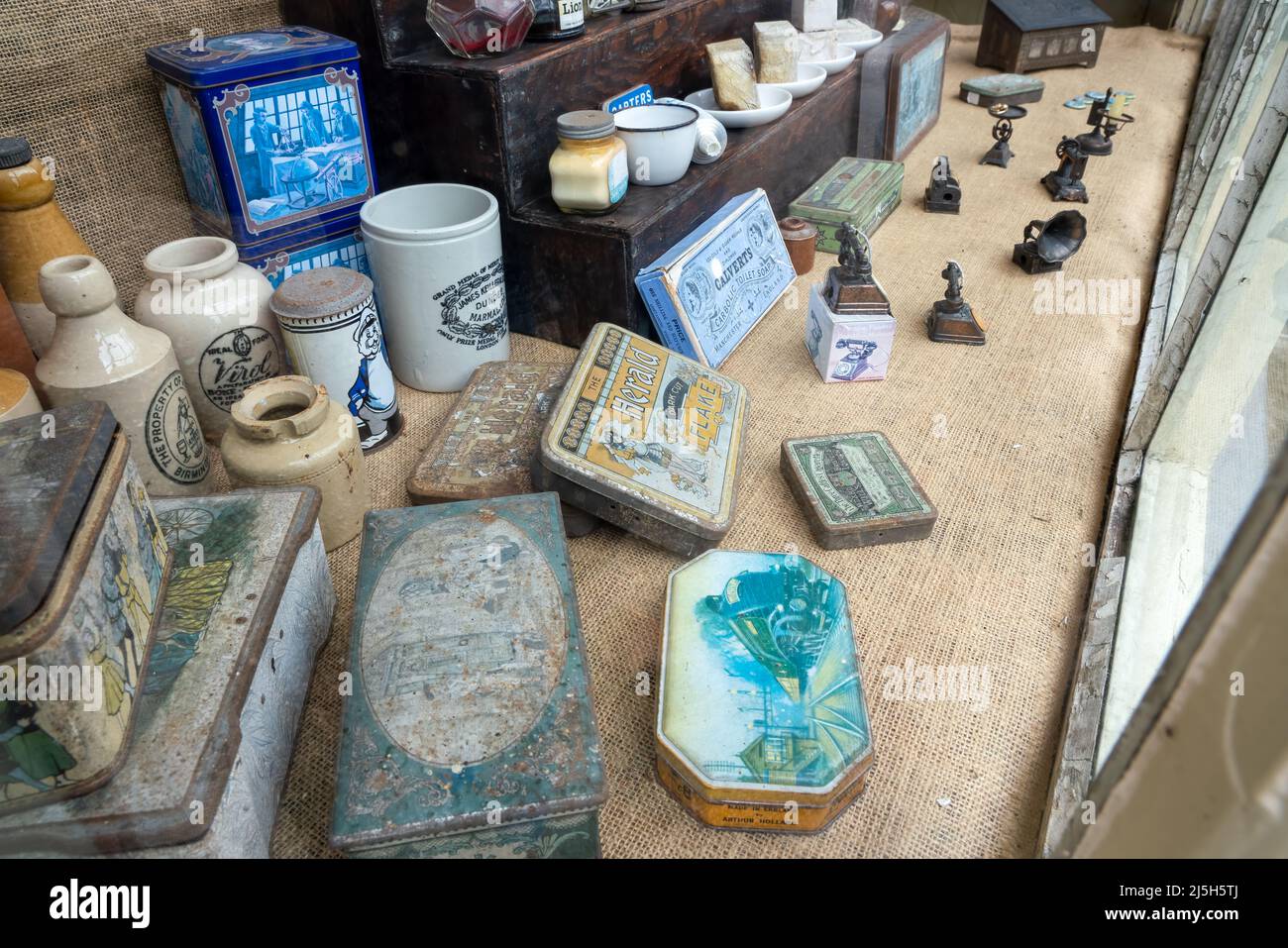 a window display of no longer made or available early 20th Century ...