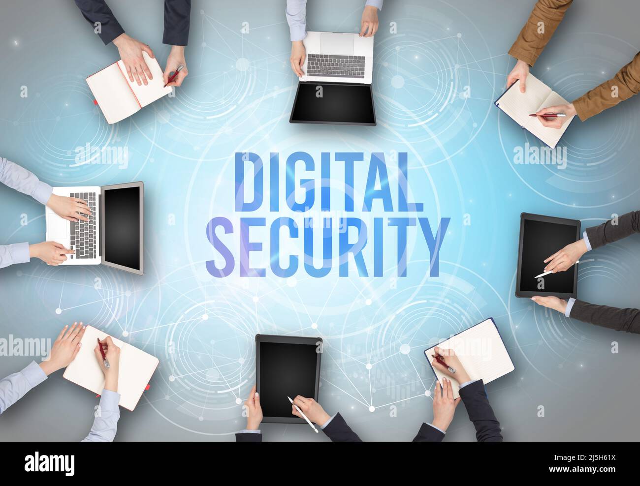 Group of people in front of a laptop, security concept Stock Photo - Alamy