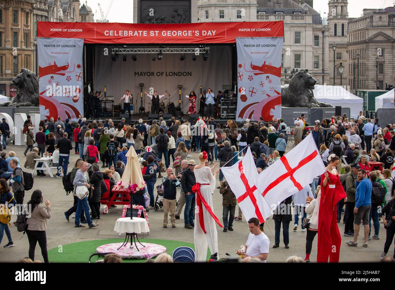 Entertainers on stilts hold English flags at the Saint George's ...