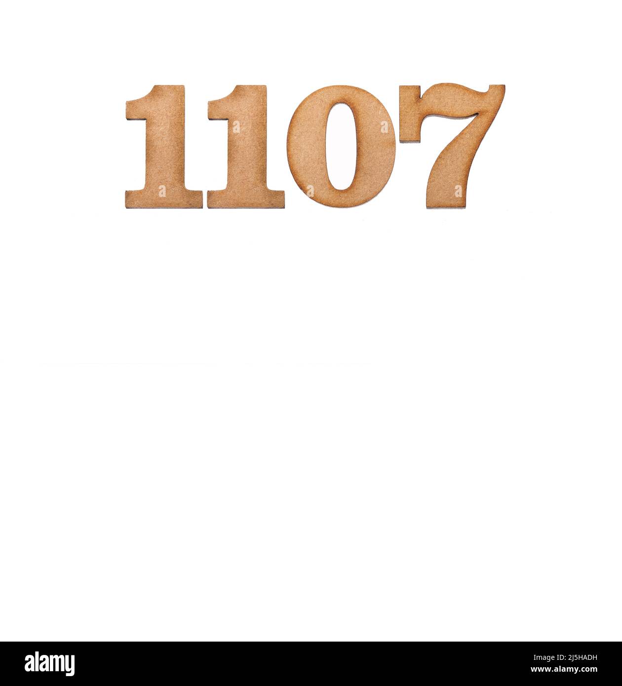 Number 1107 in wood, isolated on white background Stock Photo - Alamy