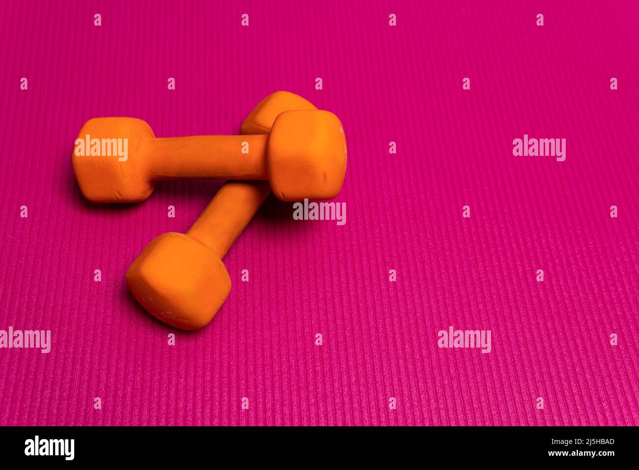 Mat orange space dumbbell fitness gym background concept pink, from ...