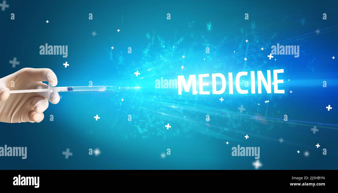 Syringe, medical injection in hand Stock Photo - Alamy