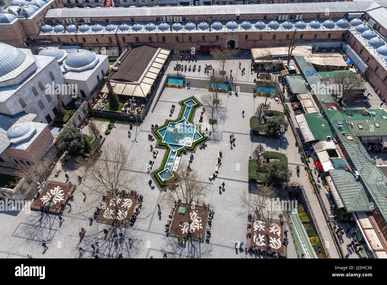 High angle aerial view of people and city architecture views around the ...