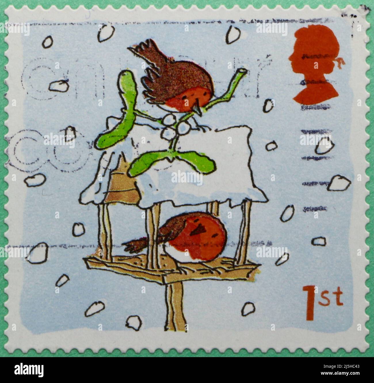 Photo of a British Christmas postage stamp with an illustration of two ...