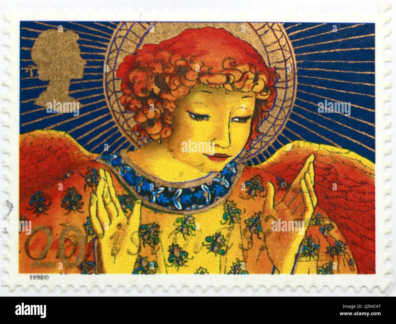 Photo of a British Christmas postage stamp with an illustration of a ...