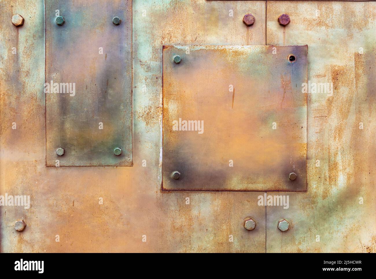 Background with metallic multicolored old coating with patches and ...