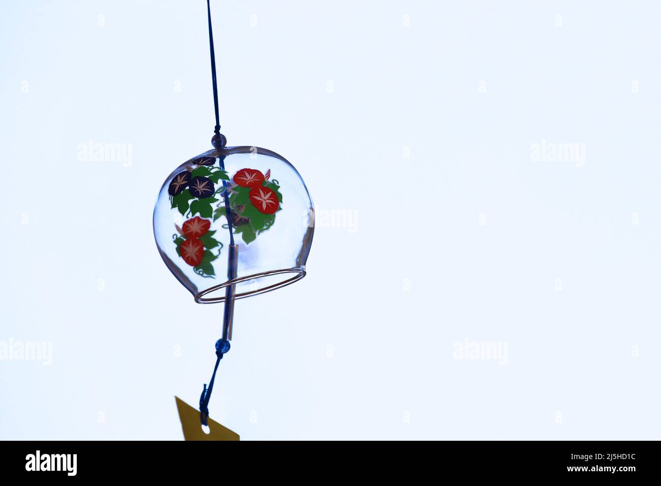 The eaves of a shop where a wind chime called "Furin", a Japanese ...