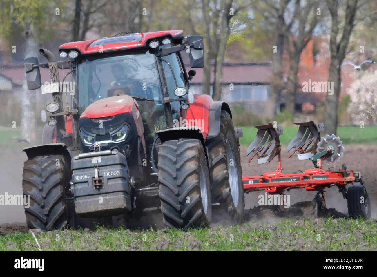 Tractor with a plow hi-res stock photography and images - Alamy