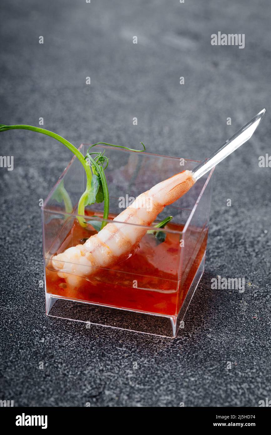 Bright snacks for a banquet table on a black background. Catering Stock ...