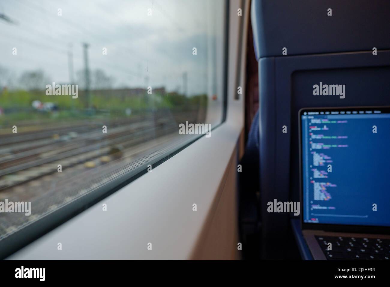 Selective Focus Open Laptop Or Notebook Working As Programmer And Do Some Coding On The Train