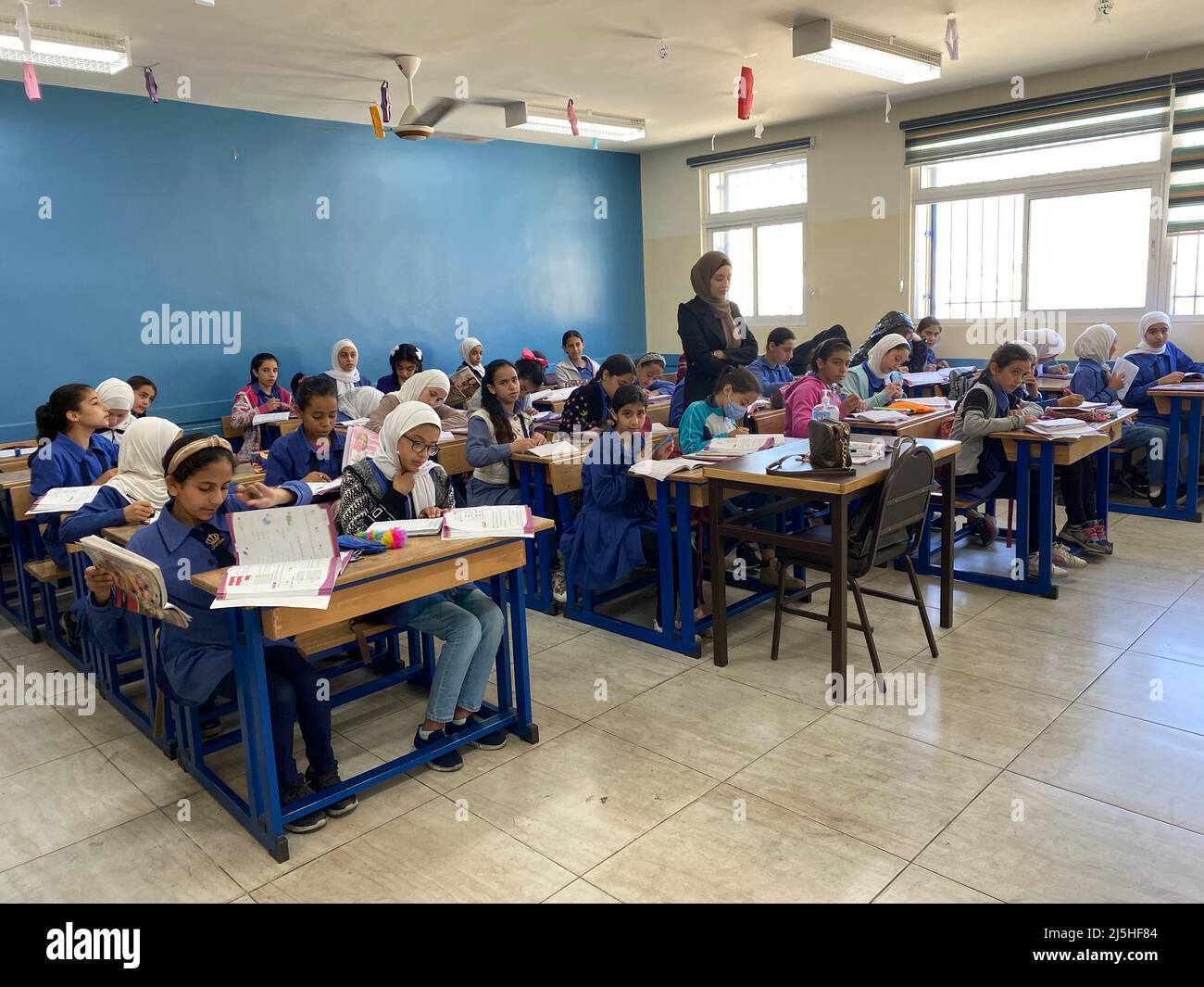 Amman, Jordan. 21st Apr, 2022. Students attend a class at a school of ...