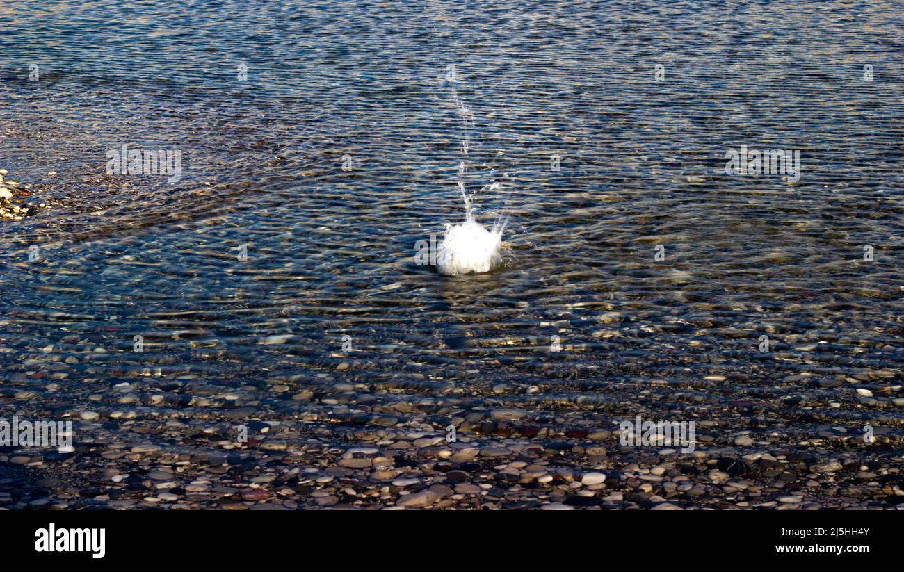 Sea ripple or shiny pebble reflection at Antalya beach, Turkey Stock ...