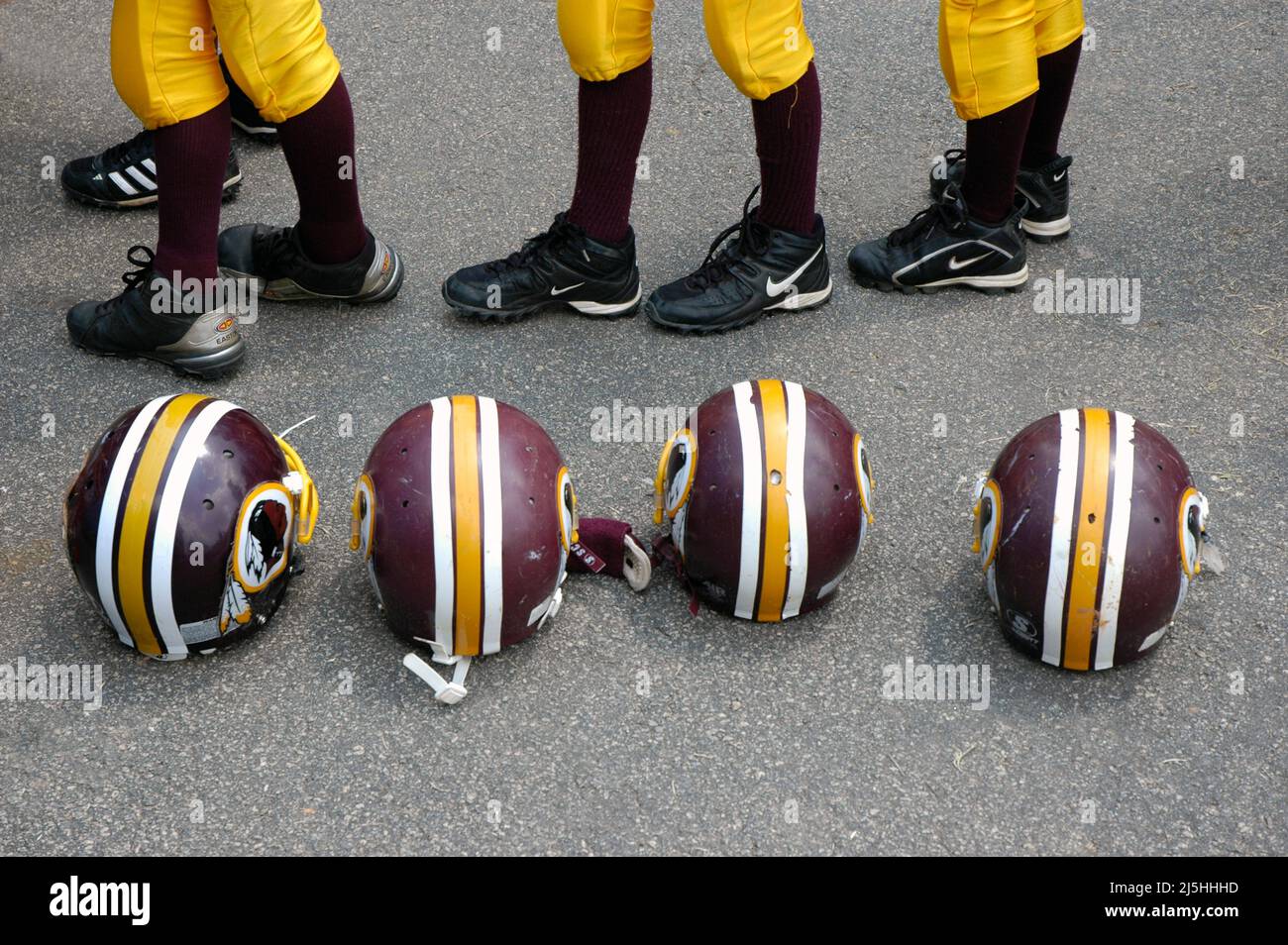 Kids football practice for full contact sport Stock Photo - Alamy