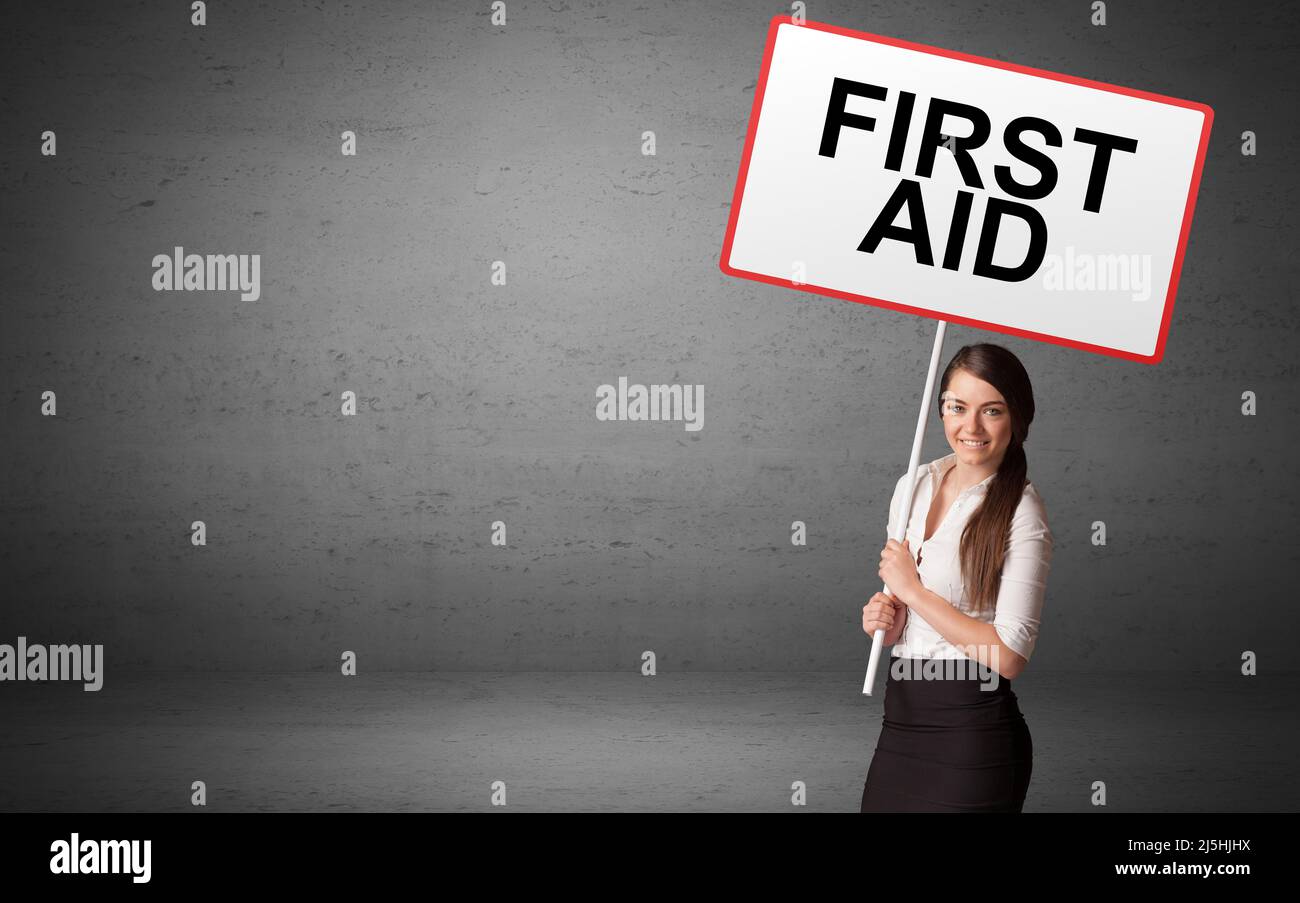 business person holding a traffic sign Stock Photo - Alamy