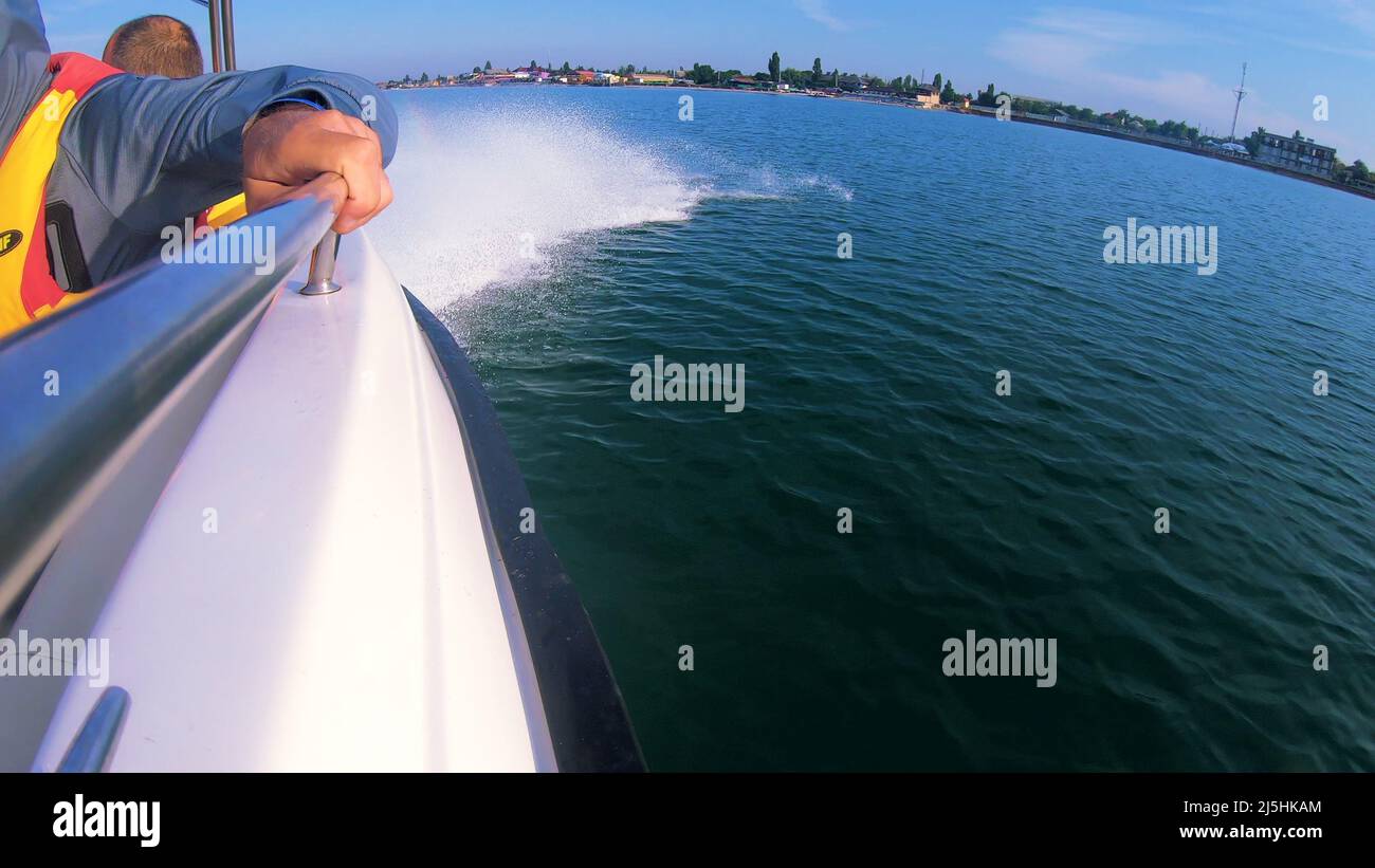 Boat jumping on waves on sunny summer day. Yacht motor boat sailing ...