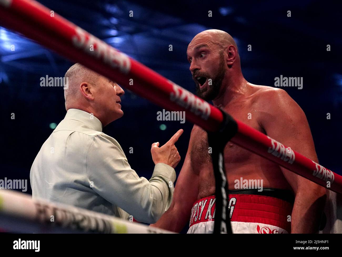 Tyson Fury with referee Mark Lyson during his WBC heavyweight title ...