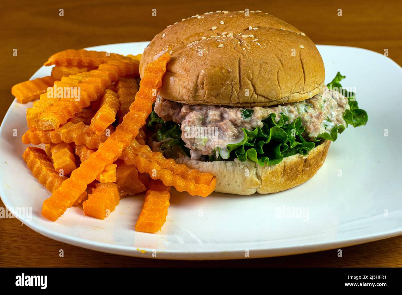 tuna salad sandwich served with butternut squash fries Stock Photo - Alamy