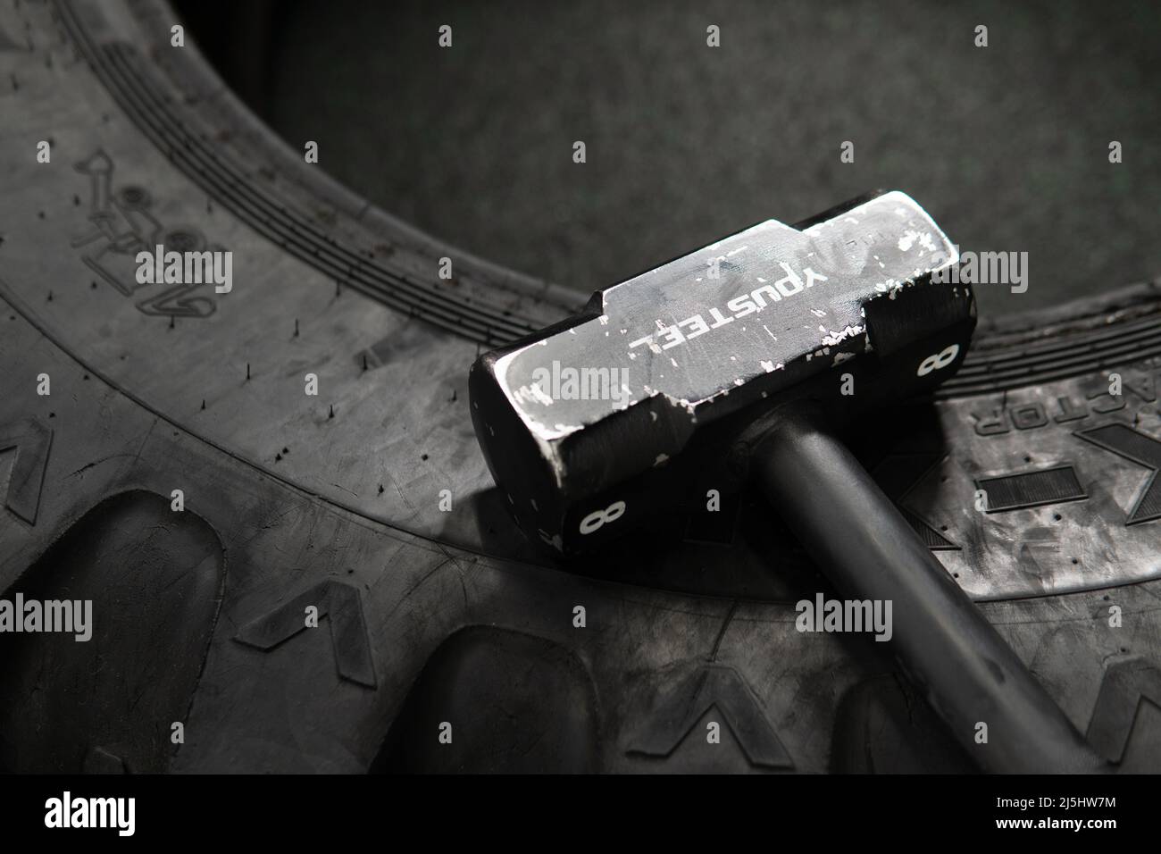 Black tire crossfit wheel sledgehammer workout athlete bodybuilding ...