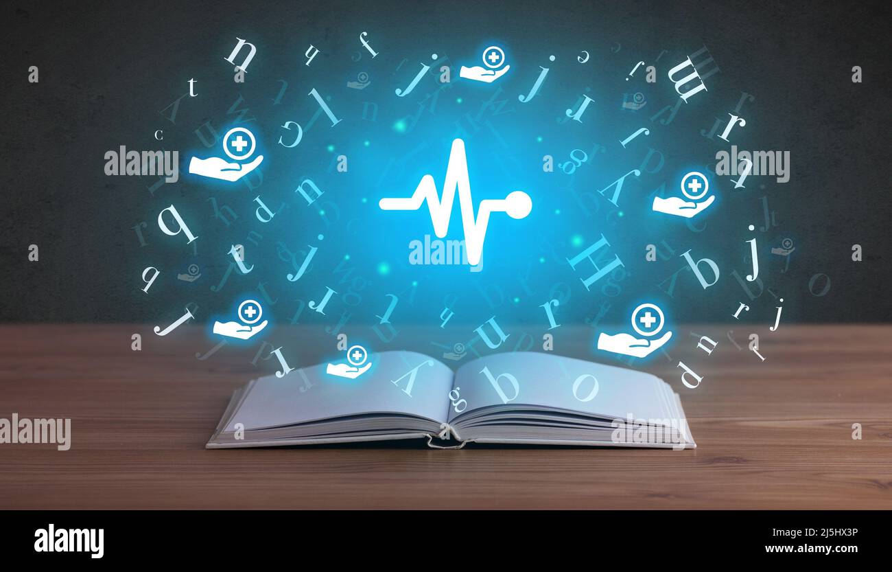 Open medical book with health icons above Stock Photo - Alamy