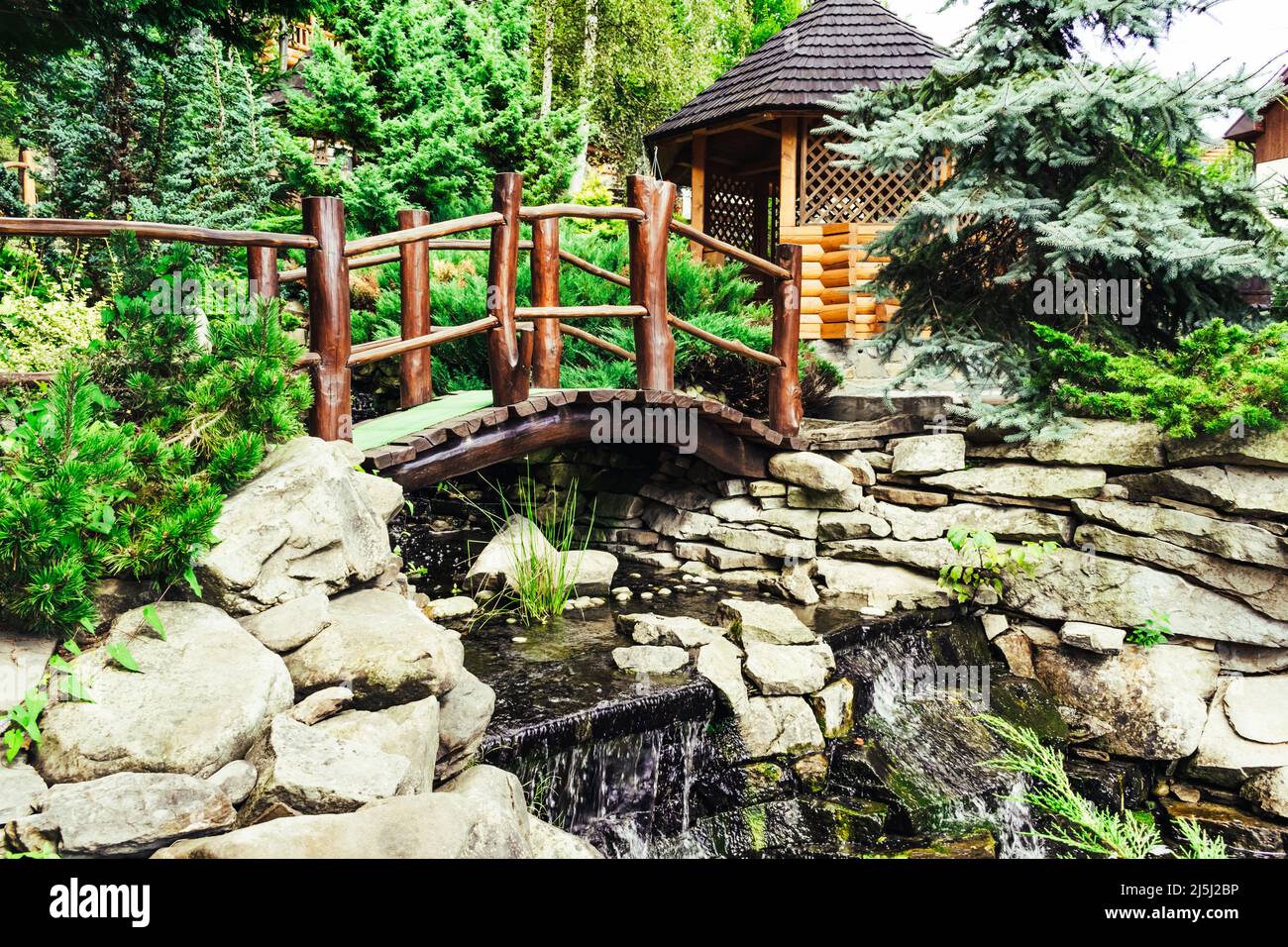 Photo of exterior designed forest short river or stream bridge with ...