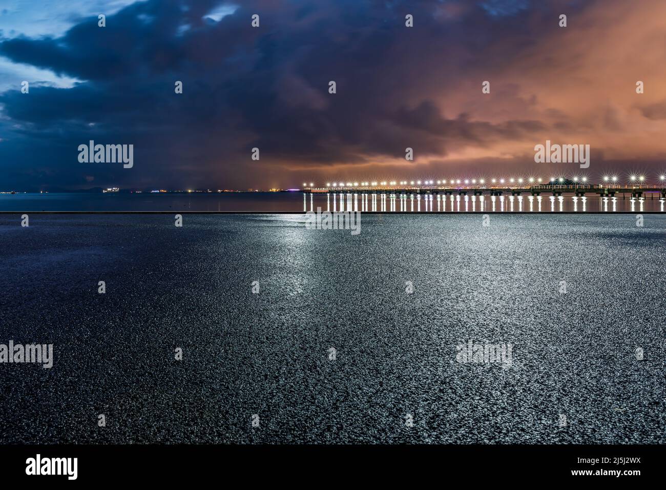 Empty asphalt road platform and clouds scenery at night Stock Photo - Alamy