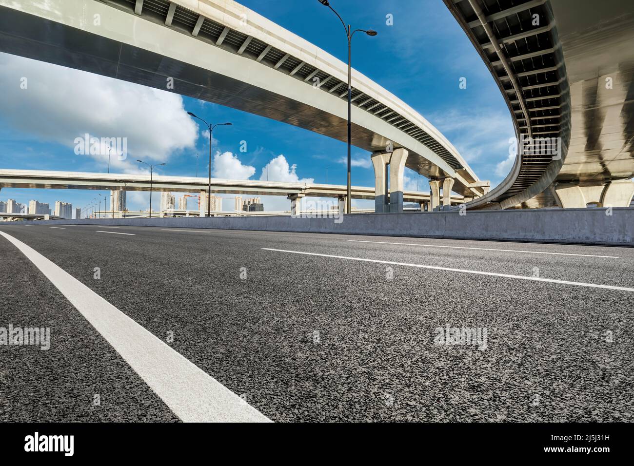 Empty asphalt road and bridge building background Stock Photo - Alamy