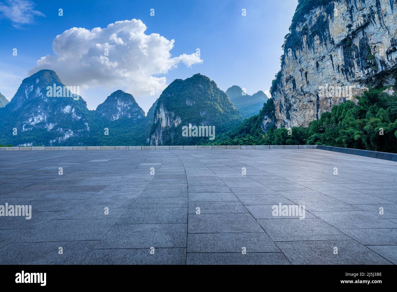 Empty square floor and mountain nature scenery. Road and mountains ...