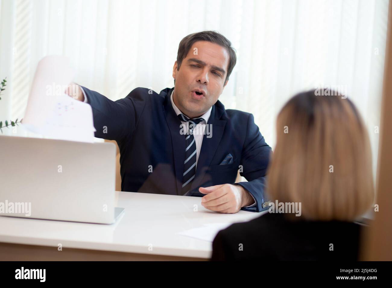 Executive or boss angry and complaining employee with work failure at ...