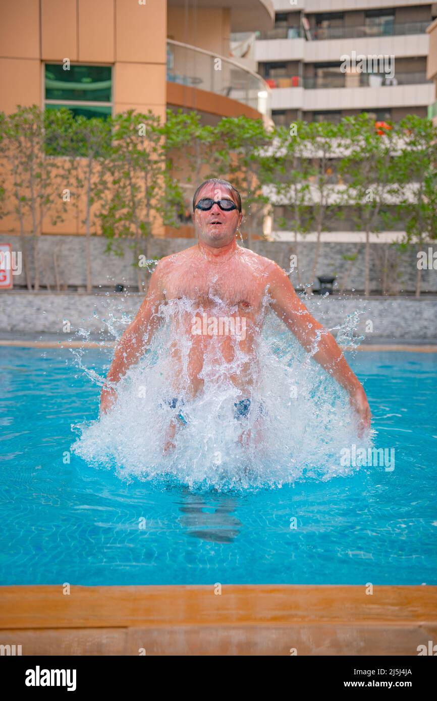 Male jumping pool hi-res stock photography and images - Alamy
