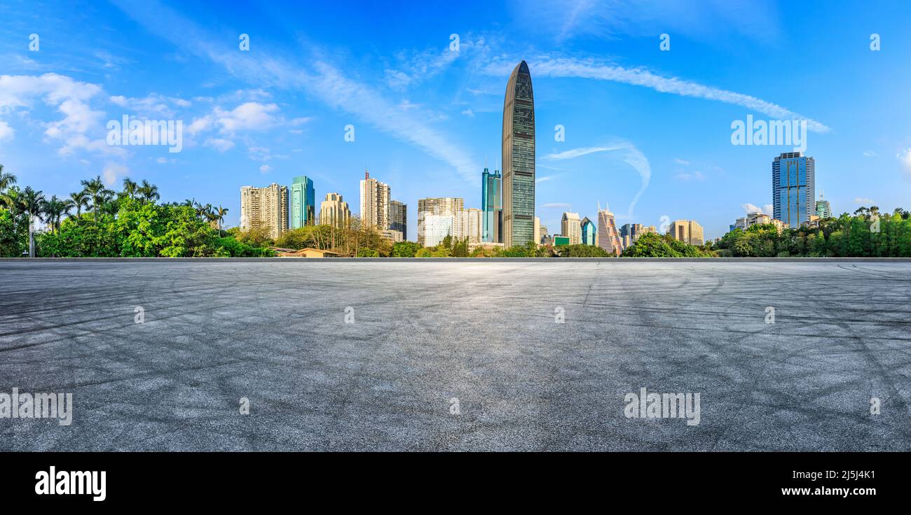 Asphalt road platform and modern commercial buildings in Shenzhen ...