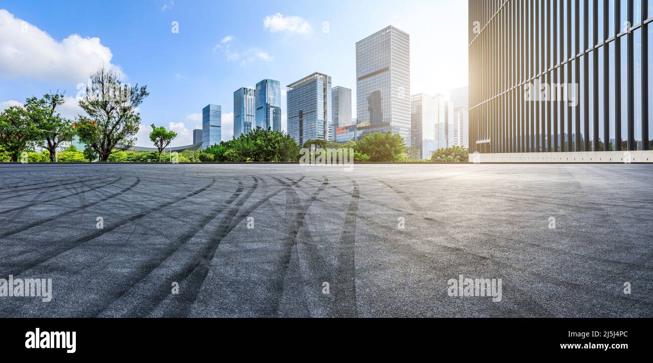 Asphalt road platform and modern commercial buildings in Shenzhen ...