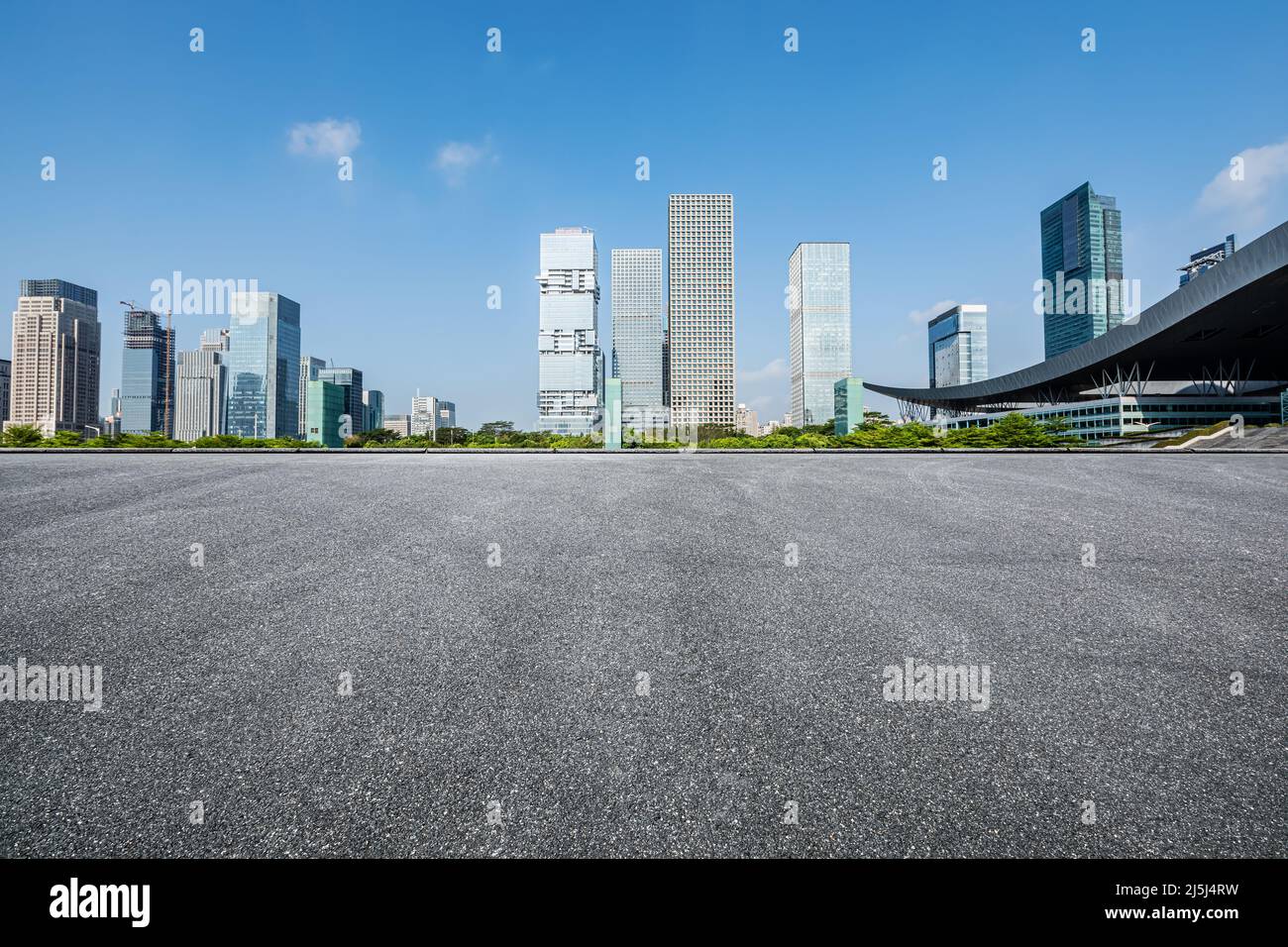 Asphalt road platform and modern commercial buildings in Shenzhen ...
