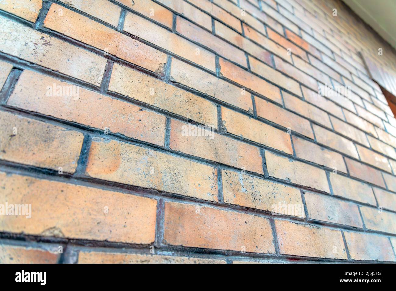 Weathered brick wall with black grout at San Francisco, California ...