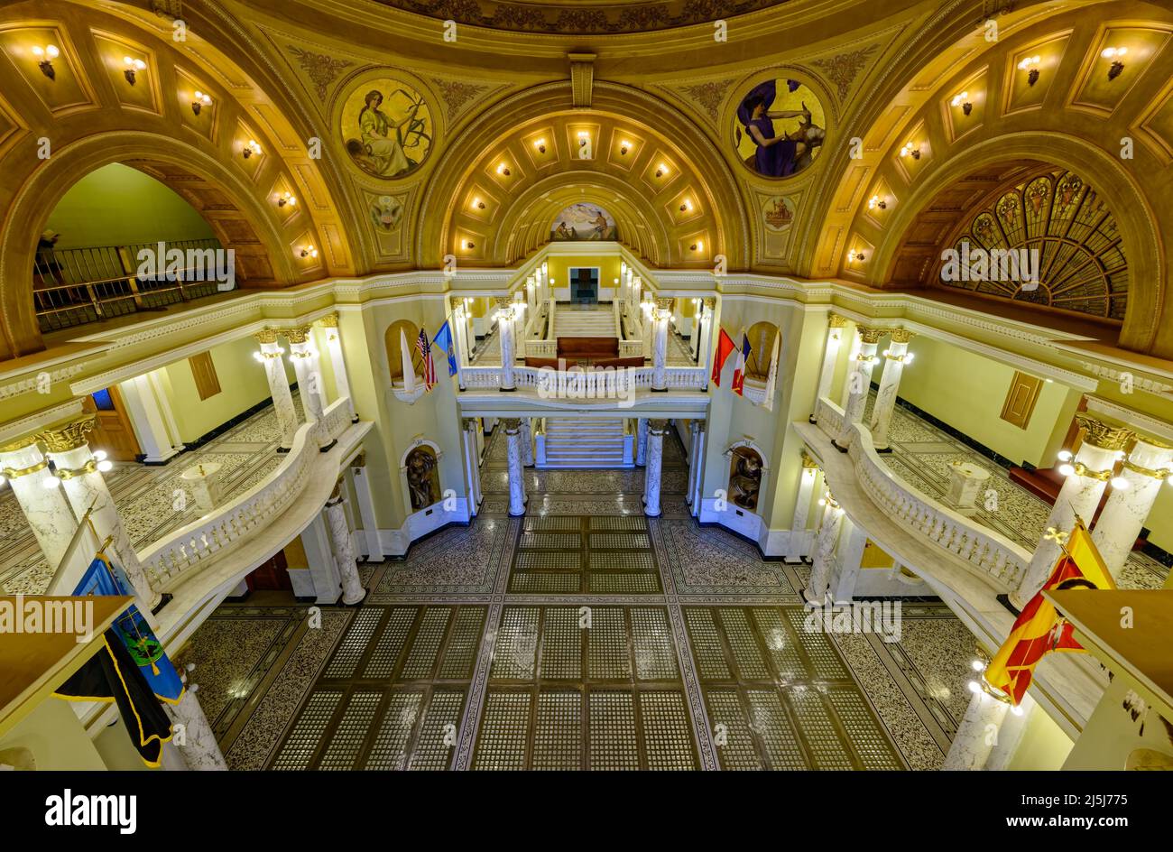 Arches enclose the atrium of the State Capitol in Pierre, South Dakota ...