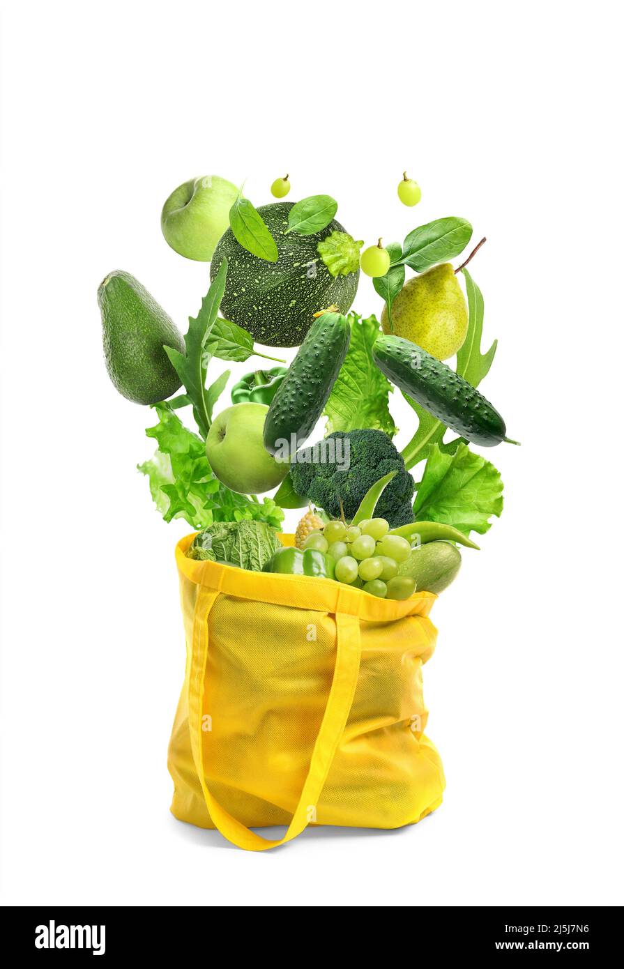 Shopping bag with flying fresh vegetables and fruits on white ...