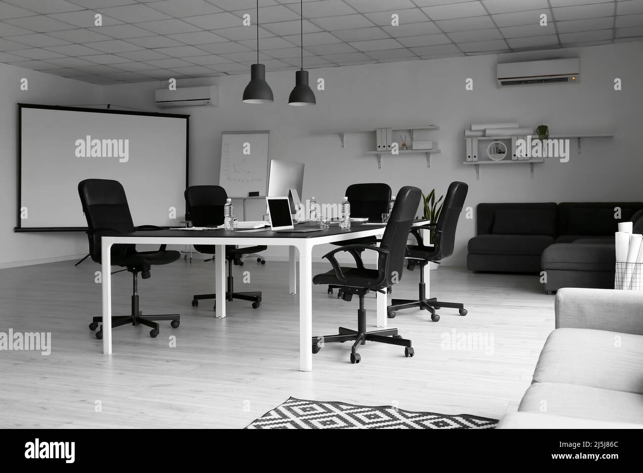 Interior of conference hall with big table and modern computers Stock ...