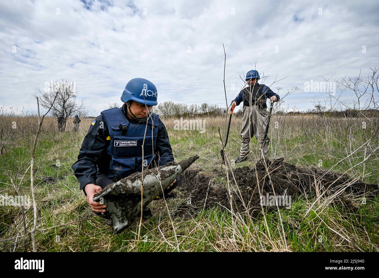An expert of a State Emergency Service bomb squad holds the remains of ...
