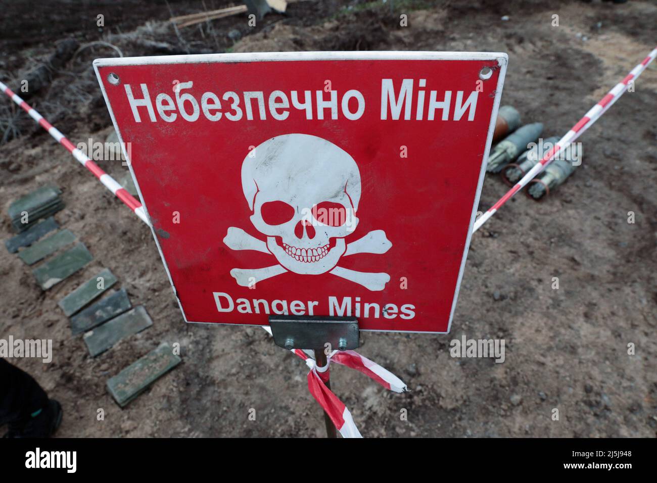 The 'Danger Mines' warning sign is pictured during a mine clearance ...