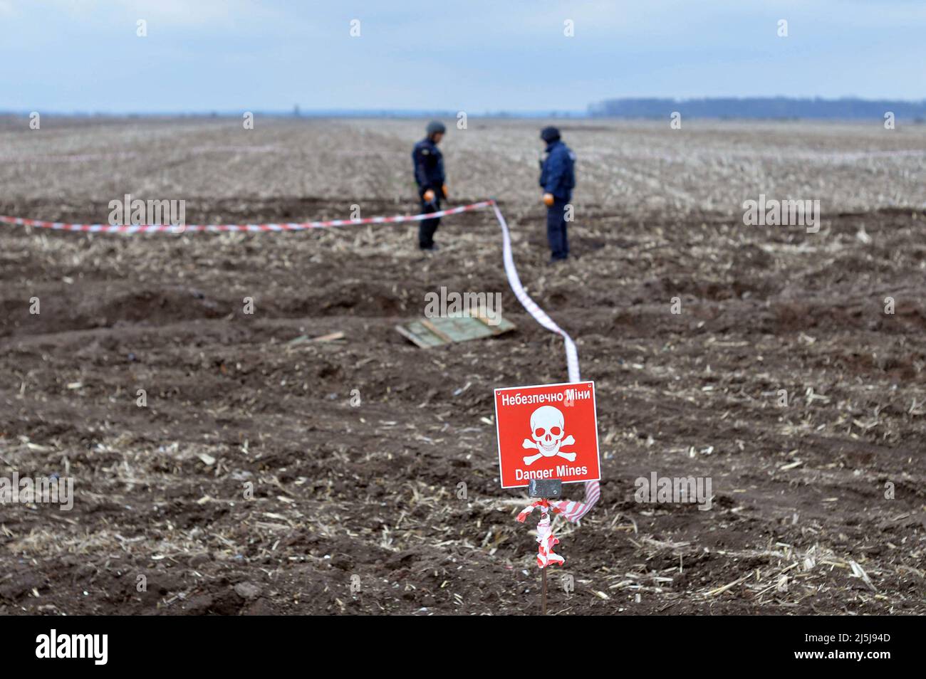 The 'Danger Mines' warning sign is pictured during a mine clearance ...