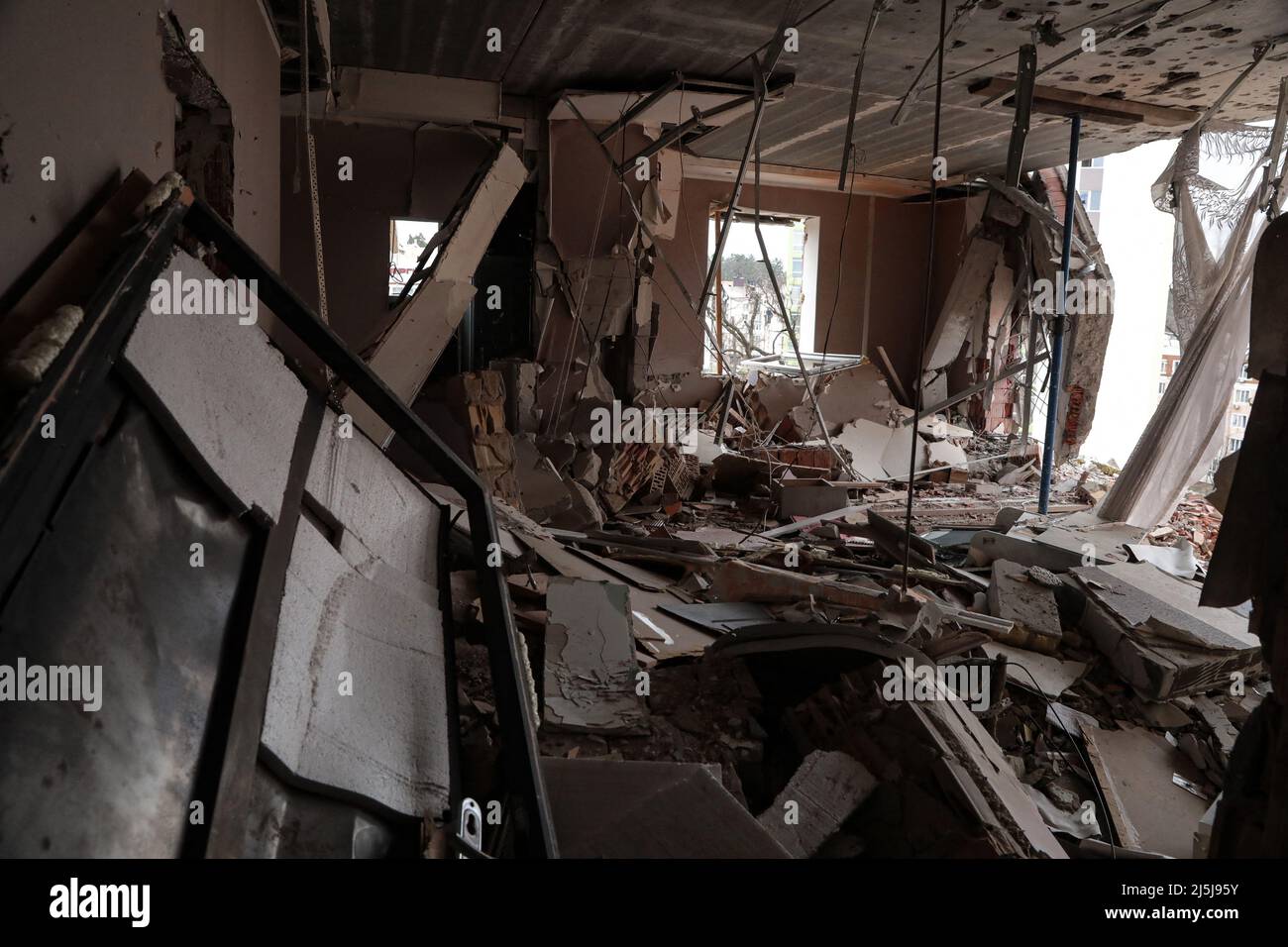 An apartment shows damage in a residential building hit by a Russian ...