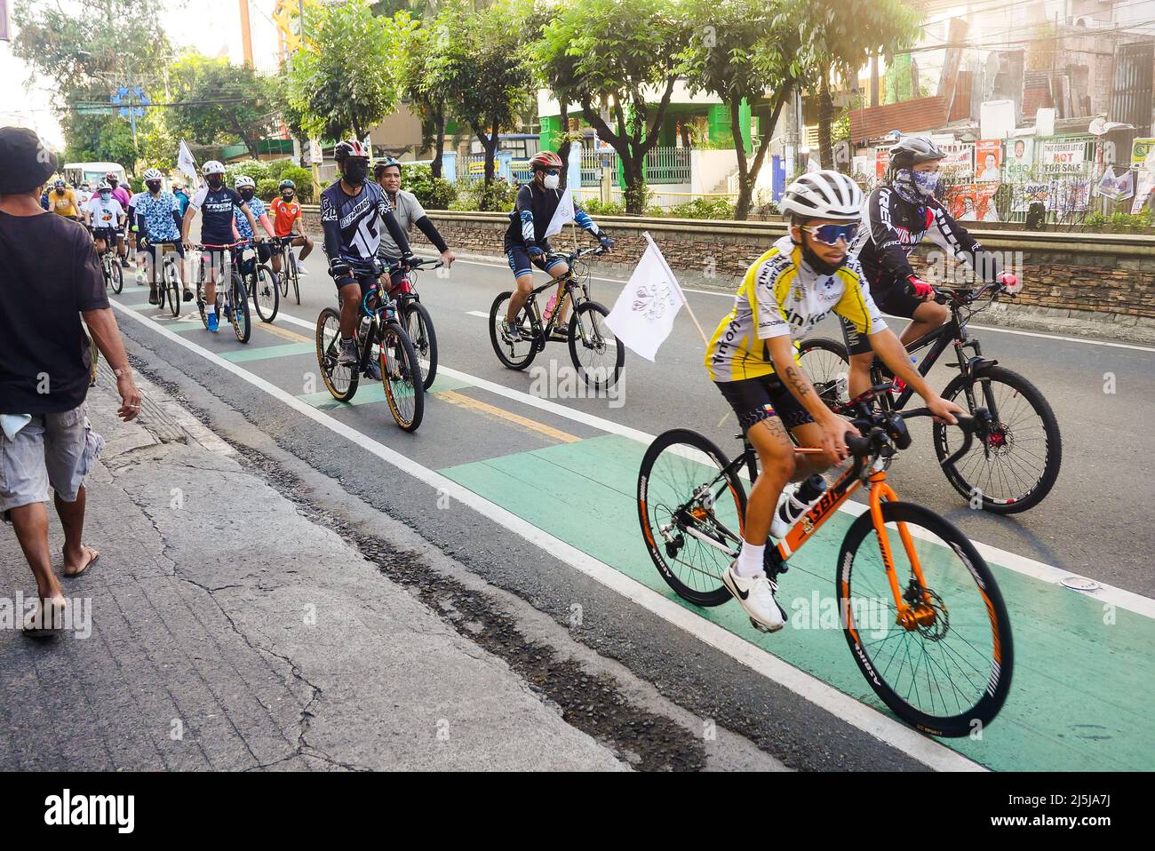 National Capital Region, Philippines. 24th Apr, 2022. Cyclists sets up ...